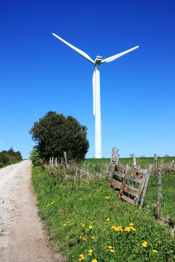 Wind Turbine in Country Lane Stock Image - Image of power, metal: 15320895