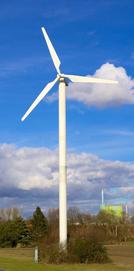 Wind turbine and factory stock photo. Image of electric - 39015586