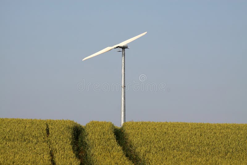Wind turbine in field. stock image. Image of windturbine - 20150417