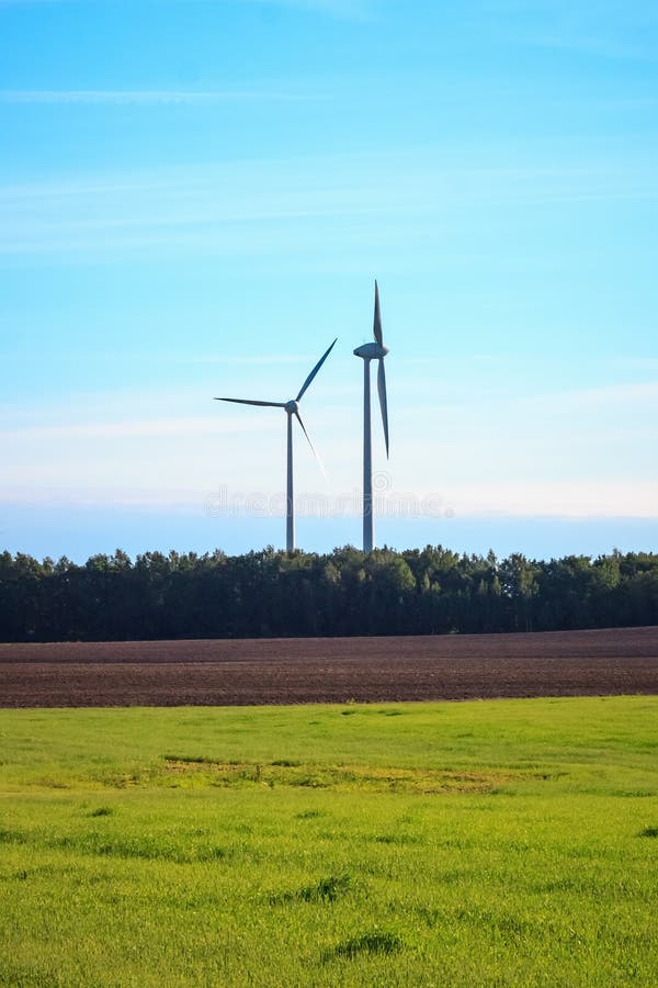 Wind Turbine in the Field. Wind Generator. Blue Sky. Stock Image ...