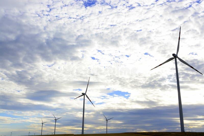 Wind Power Plant at Clouds and Sky Stock Image - Image of grassland ...