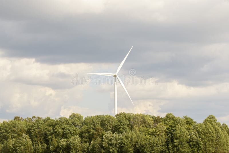 Wind Turbine in the Forest Near the Road Stock Photo - Image of ...