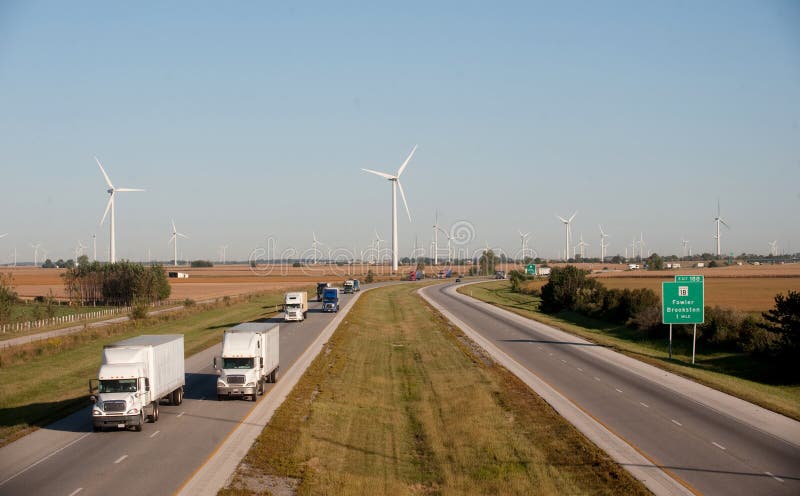 Wind turbine and highway stock photo. Image of semi, transportation ...