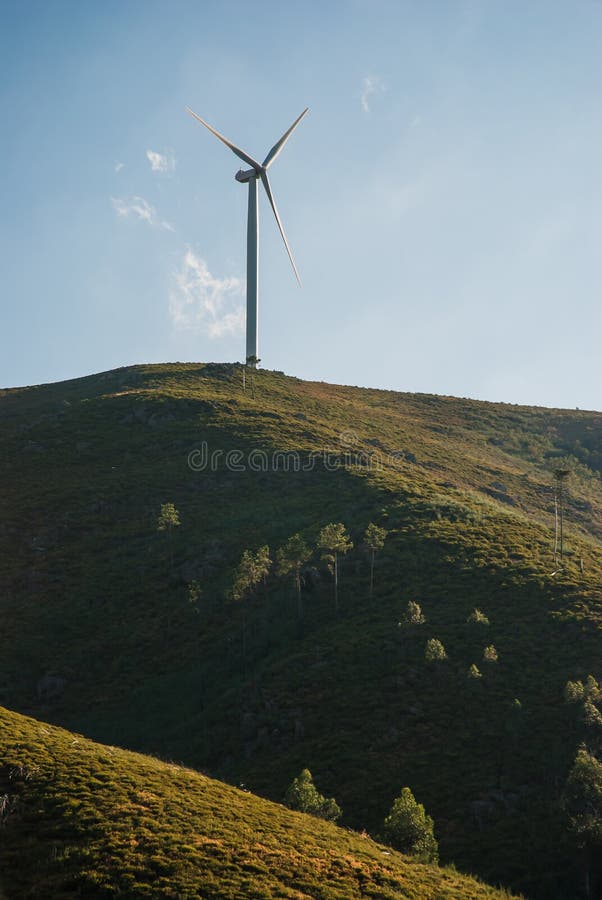 Wind turbine on a hill stock photo. Image of power, environment - 38635932