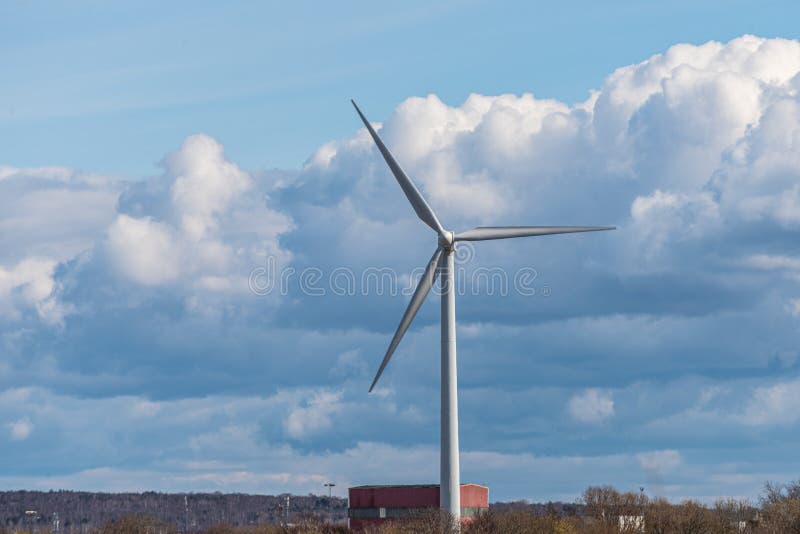 Wind Turbine by Industrial Buildings.. Stock Image - Image of farm ...