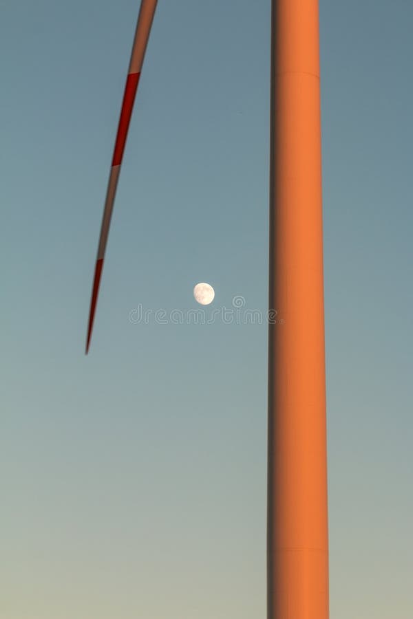 Wind turbine and moon stock photo. Image of ecological - 76617562