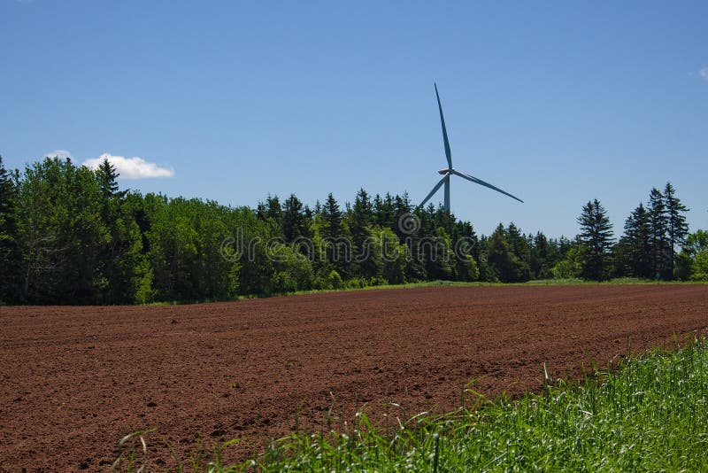 WInd turbine in PEI stock photo. Image of blue, island - 95013870