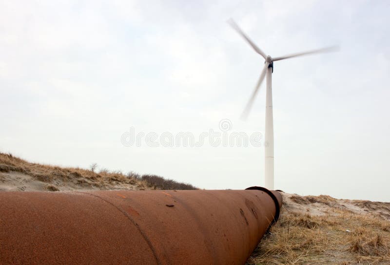 Wind Turbine and pipeline stock photo. Image of sustainable - 12646346