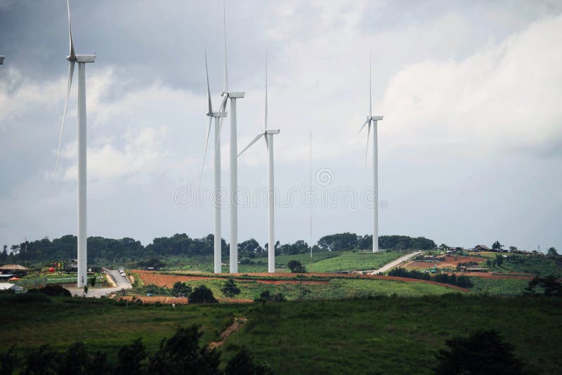 Wind Turbine Power Generator Farm at Sunset Background Stock Photo ...