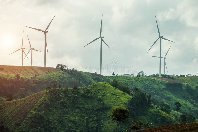 Wind Turbine Power Generator Farm at Sunset Background Stock Photo ...