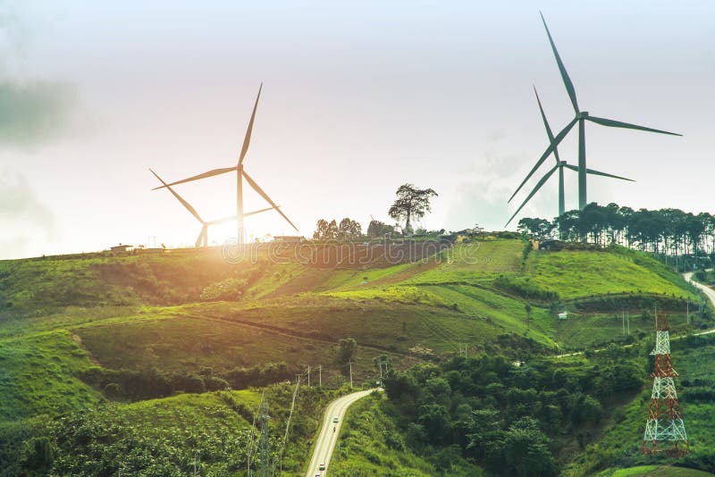 Wind Turbine Power Generator Farm at Sunset Background Stock Photo ...