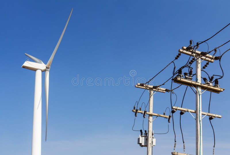 Wind Turbine and Power Lines Transporting Stock Photo - Image of ...