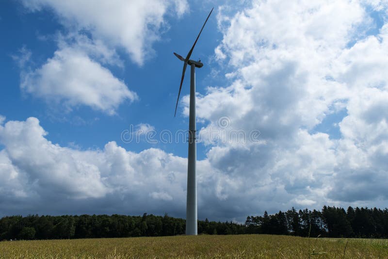 Wind Turbine Produces Energy Stock Photo - Image of house, background ...