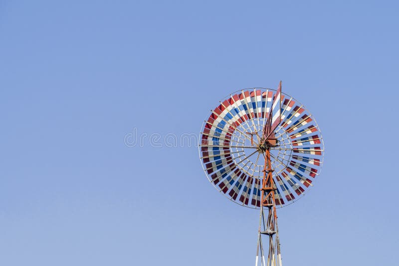 Wind Turbine of Red, White, Blue Color and Old with Blue Sky. Stock ...