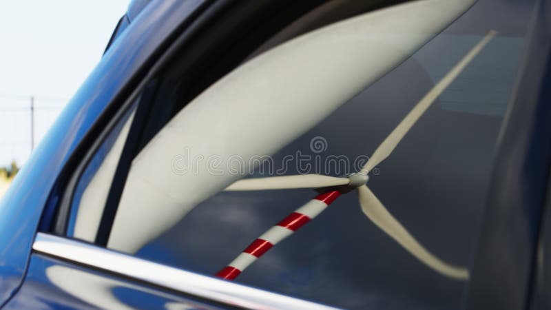 Wind Turbine Reflected on a Window of a Car Stock Footage - Video of ...