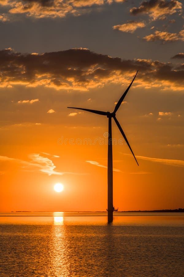 Wind Turbine in the Sea in Summer Sunset Stock Image - Image of ...