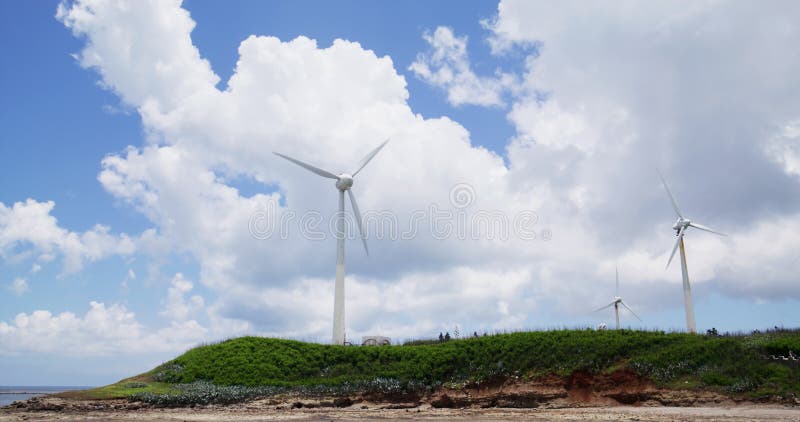 Wind turbine at seaside stock photo. Image of nature - 254171808