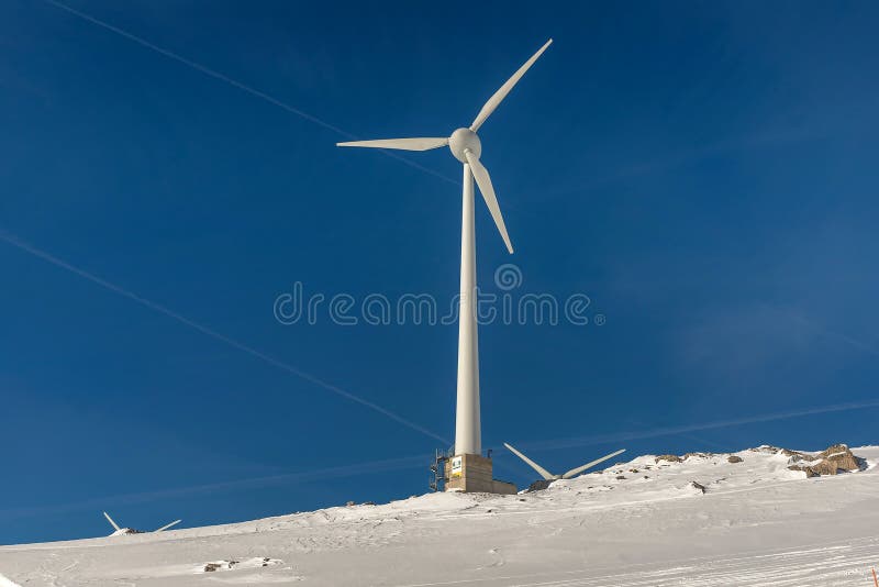 Wind Turbine and Snow in the Alps, Switzerland Stock Photo - Image of ...