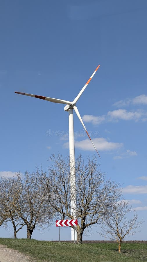 Wind Turbine in Spring Landscape with Clear Blue Sky Stock Image ...