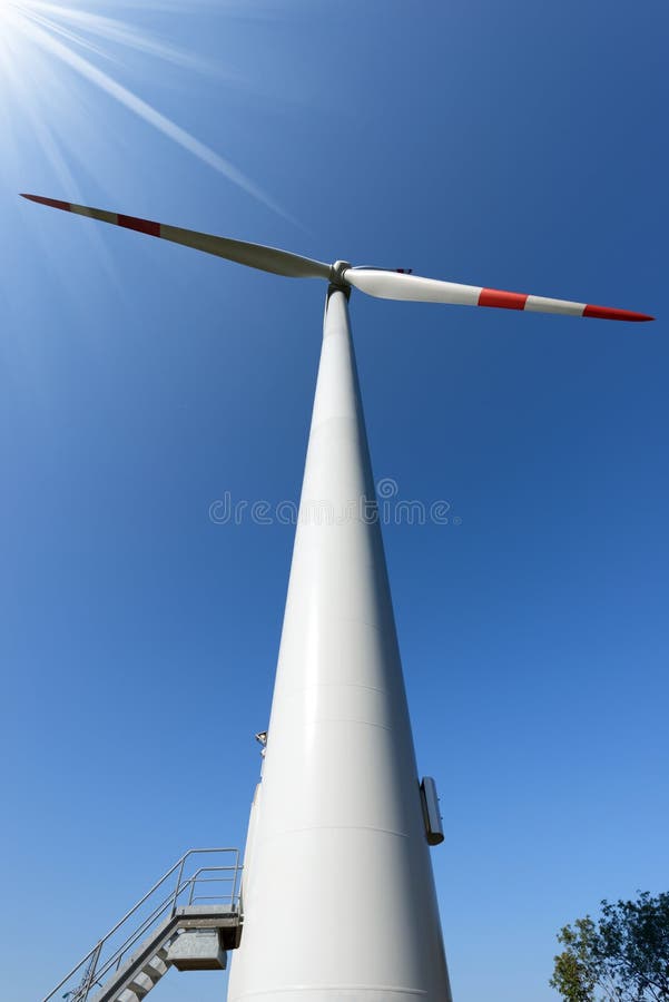 Wind Turbine with Sun Rays stock photo. Image of supply - 77662154