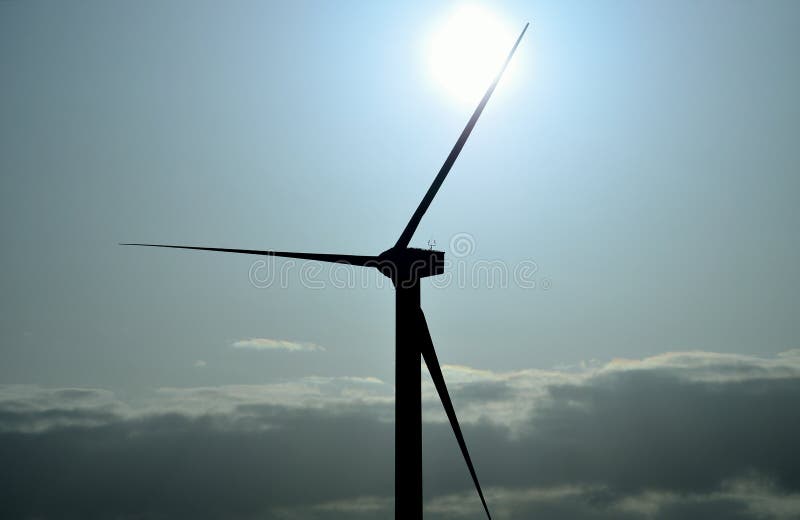 Wind turbine at sunrise stock photo. Image of wind, climate - 86537156
