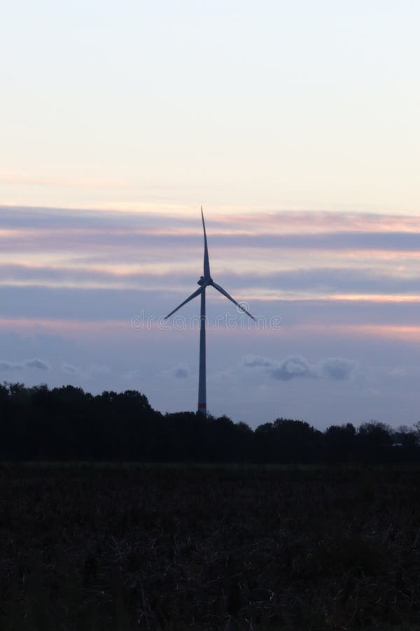 Wind turbine stock image. Image of sunrise, three, turbine - 197670165