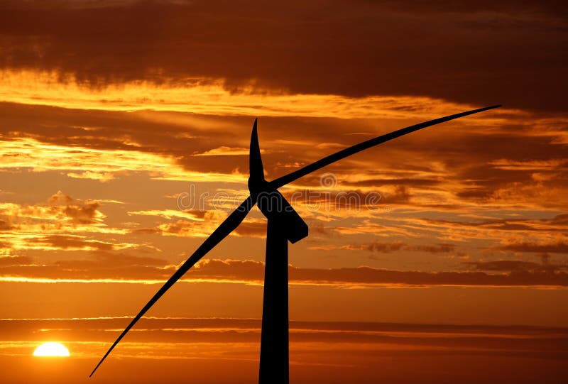 Wind turbine on the sunset stock image. Image of turbine - 103999291