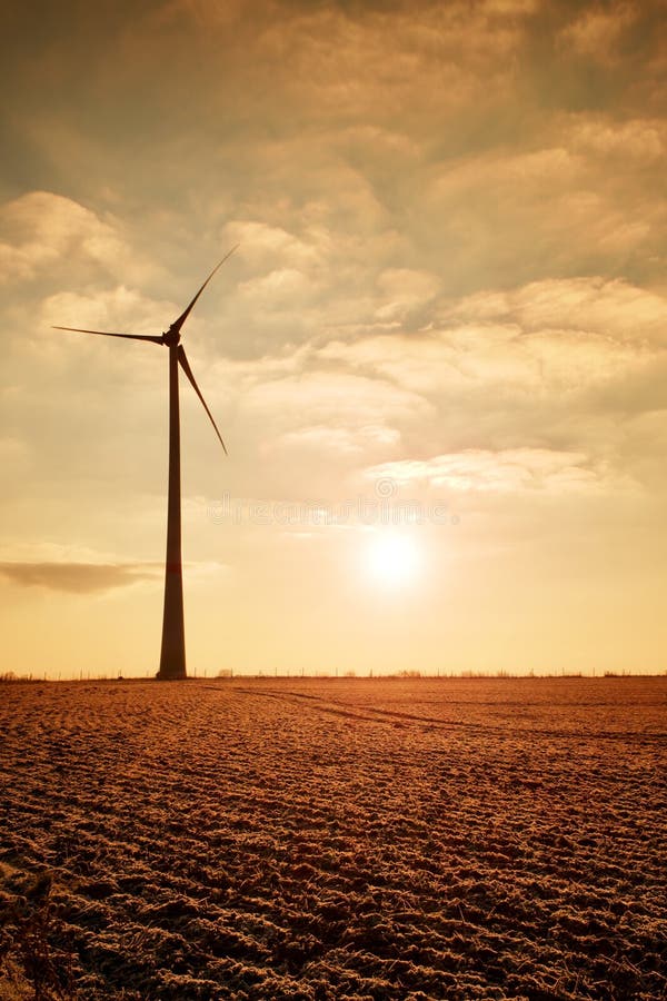Wind turbine on sunset stock image. Image of orange, dusk - 67064153