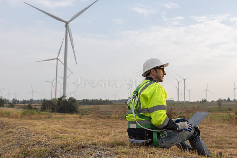 Wind Turbine Technicians Using Laptop Checking and Maintenance at ...