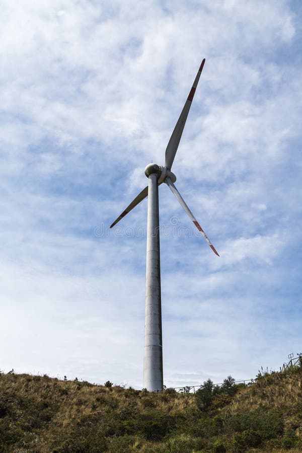 Wind turbine tower stock photo. Image of clouds, city - 118457166
