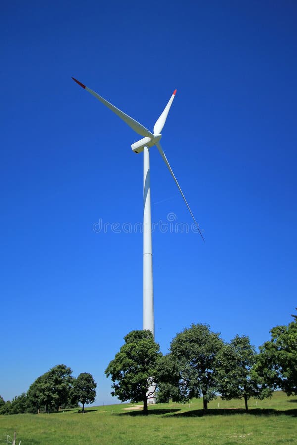 Wind turbine and trees stock image. Image of land, hill - 20415291