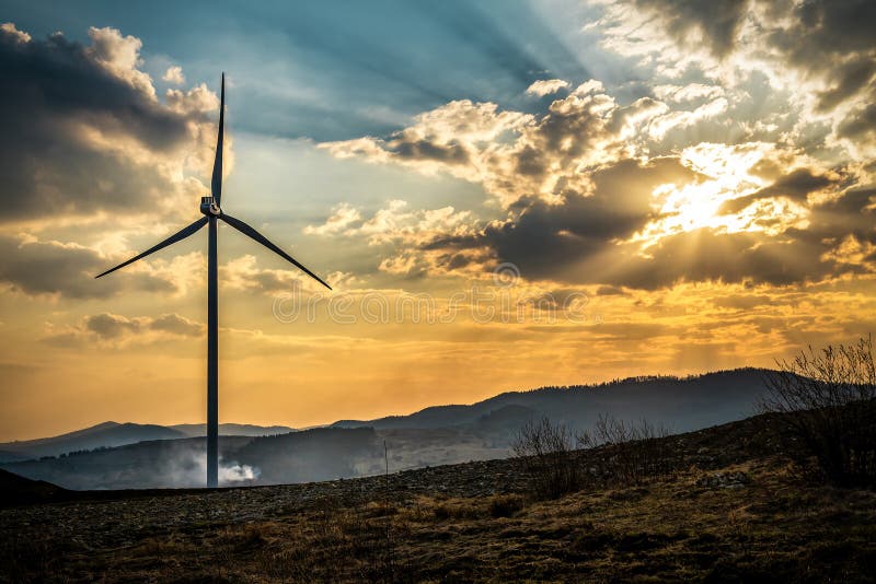 Wind Turbines at Beautiful Orange Sunset Stock Photo - Image of ...