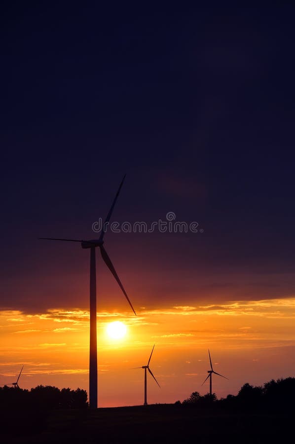 Wind Turbines During Beautiful Sunset Stock Photo - Image of generate ...