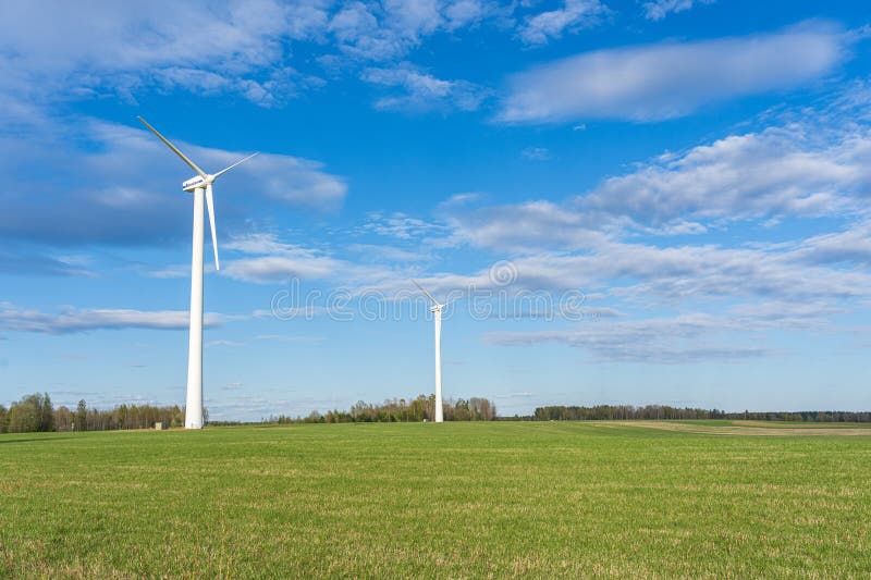 Wind Turbines on a Cereal Field in Spring Stock Image - Image of ...