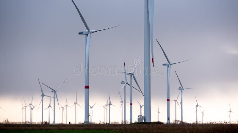 Wind Generators and Dramatic Sky in Strong Perspective Editorial Photo ...