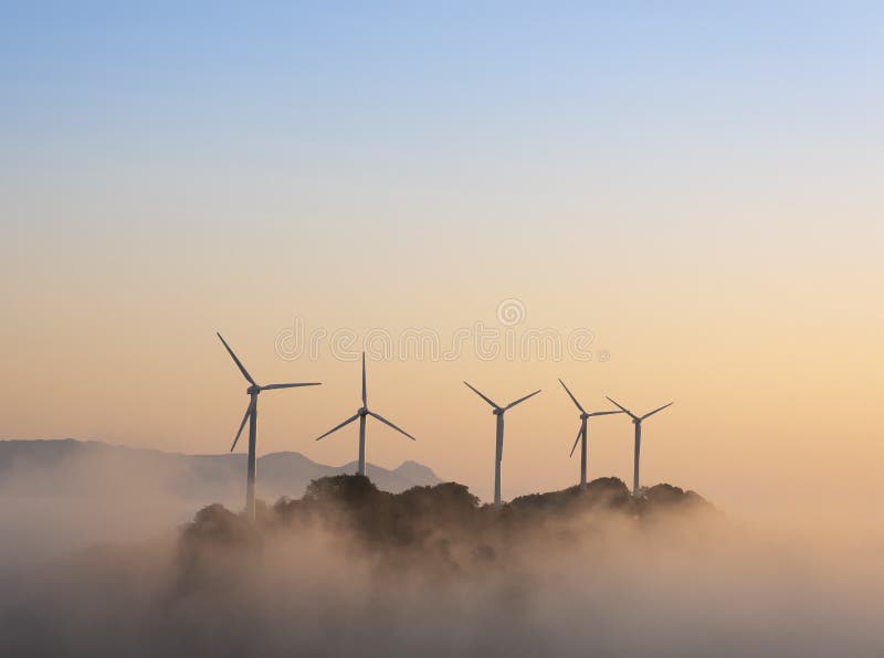 Wind Turbines and Wind Farm at Sunset among the Mountains Stock Image ...