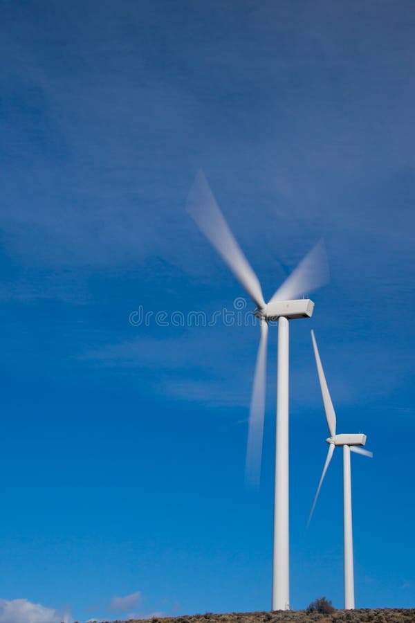 Wind Turbines with Fast Moving Blades Stock Photo - Image of windmill ...