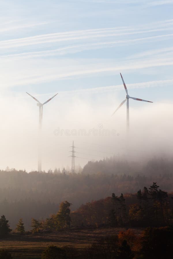 Wind turbines in fog stock image. Image of change, landscape - 18693961