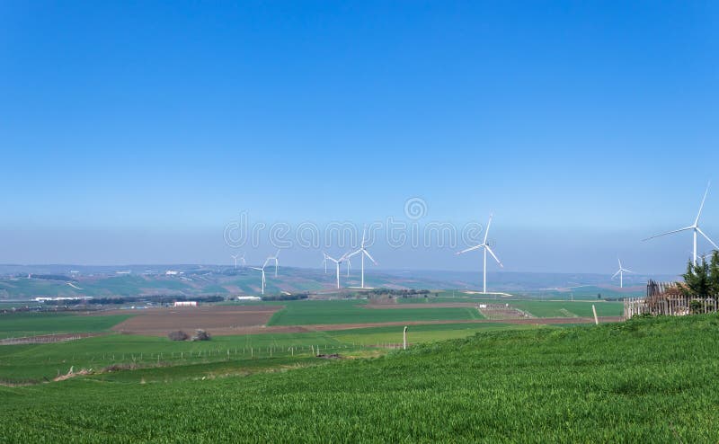 Wind Turbines Generating Energy from the Wind, in Nature, Clear Blue ...