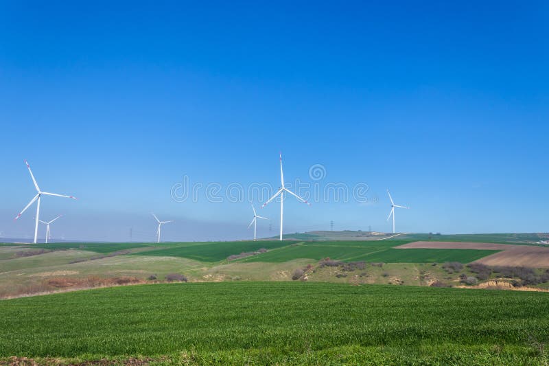 Wind Turbines Generating Energy from the Wind, in Nature, Clear Blue ...
