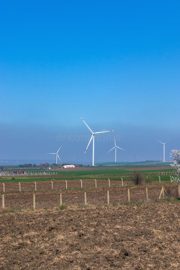 Wind Turbines Generating Energy from the Wind, in Nature, Clear Blue ...