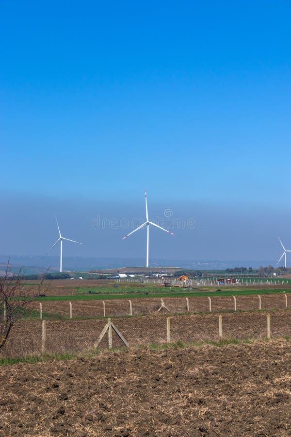Wind Turbines Generating Energy from the Wind, in Nature, Clear Blue ...