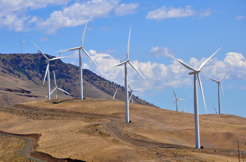 Wind turbines on hill stock photo. Image of generator - 152240790