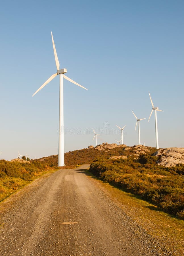 Wind Turbines in a Landscape with a Trail Stock Photo - Image of wind ...