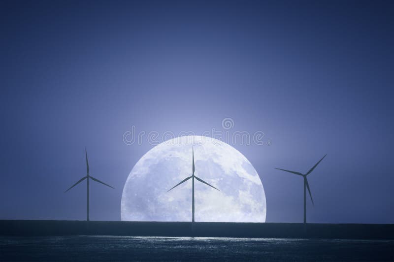 Wind turbines at night stock photo. Image of alternative - 247267624