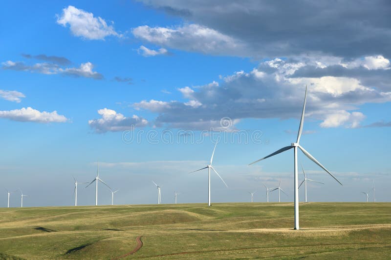 Wind Turbines in an Open Field on a Clear Day. Stock Photo - Image of ...