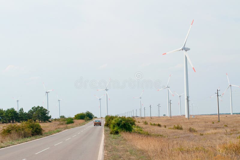 Wind turbines and a road stock photo. Image of automobile - 27650732