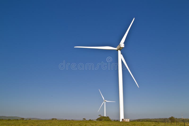 Wind turbines in a row stock photo. Image of production - 45643194