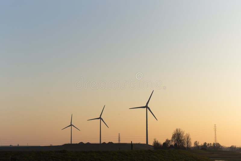 Wind Turbines Spinning during Perfect Dusk Evening Stock Photo - Image ...