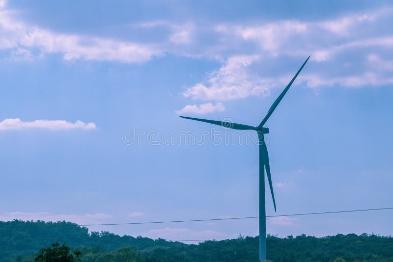 Wind Turbines or Wind Wheels and Blue Sky Background. Stock Photo ...